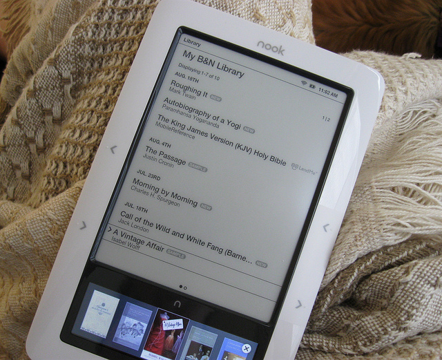 A Photograph Of A nook E reader Laying On A Blanket